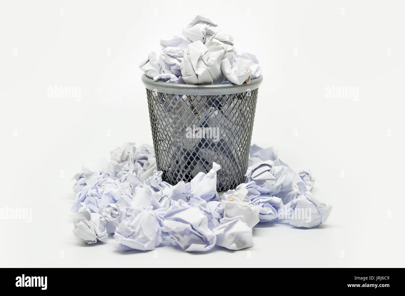 Garbage bin with paper waste isolated on white Stock Photo - Alamy