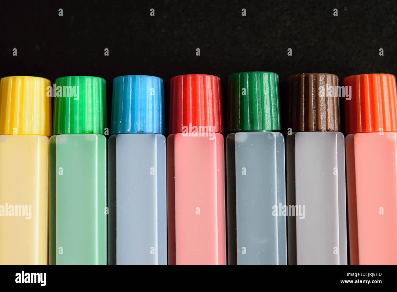 Macro background texture of lined up colorful Water color tubes Stock ...