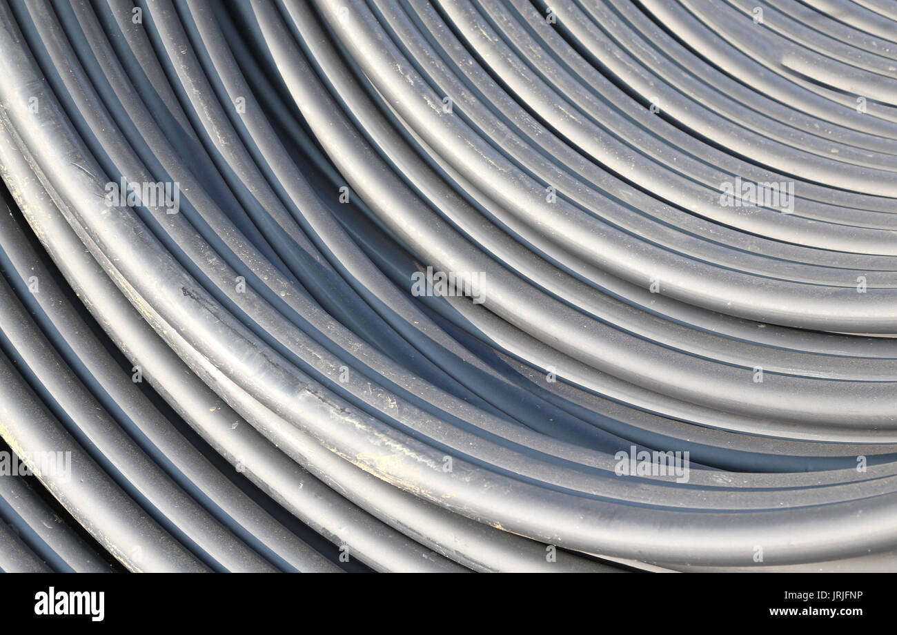 Detail of the coil for laying optical fibers in the city Stock Photo ...