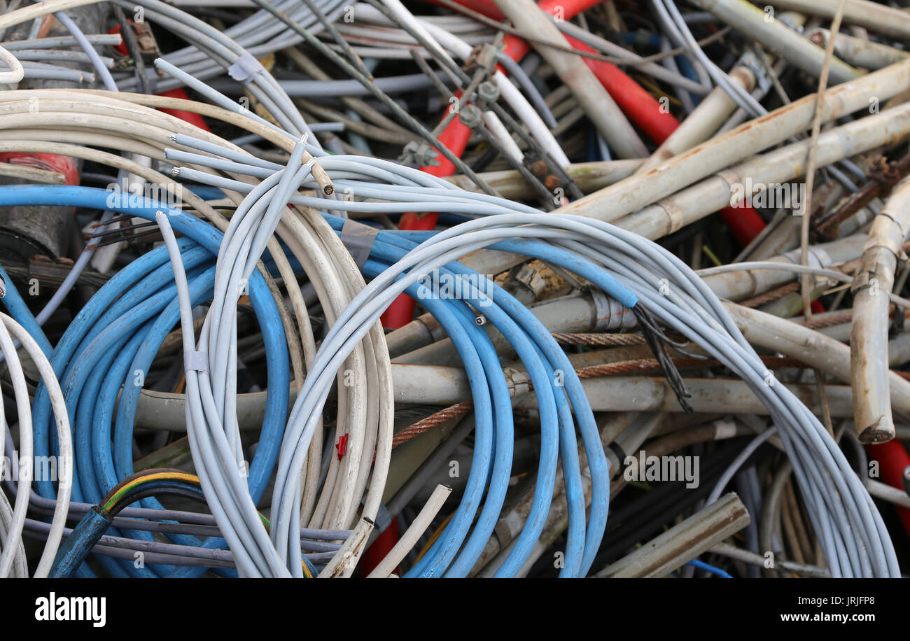 many copper cables with plastic insulation in the dump of polluting and ...