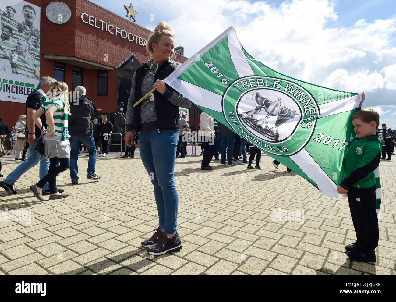 Young Celtic fan Harry Rowan attending his first game with his mum ...