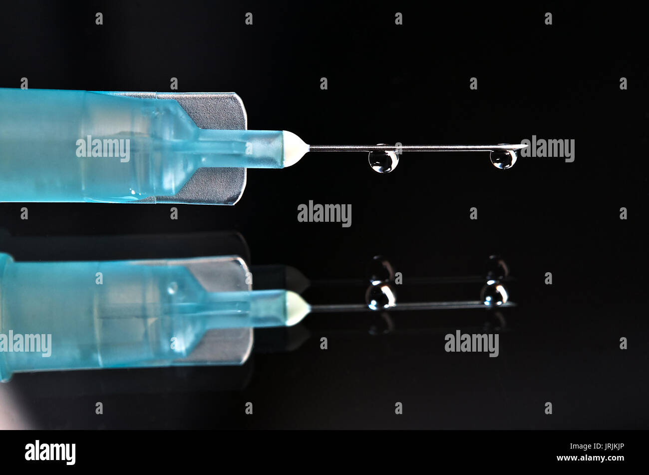 Syringe vaccine drop medicine hi-res stock photography and images - Alamy