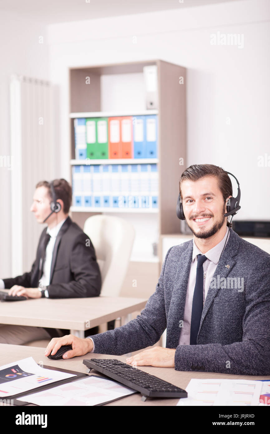 Employe from Customer service support working in the office Stock Photo ...
