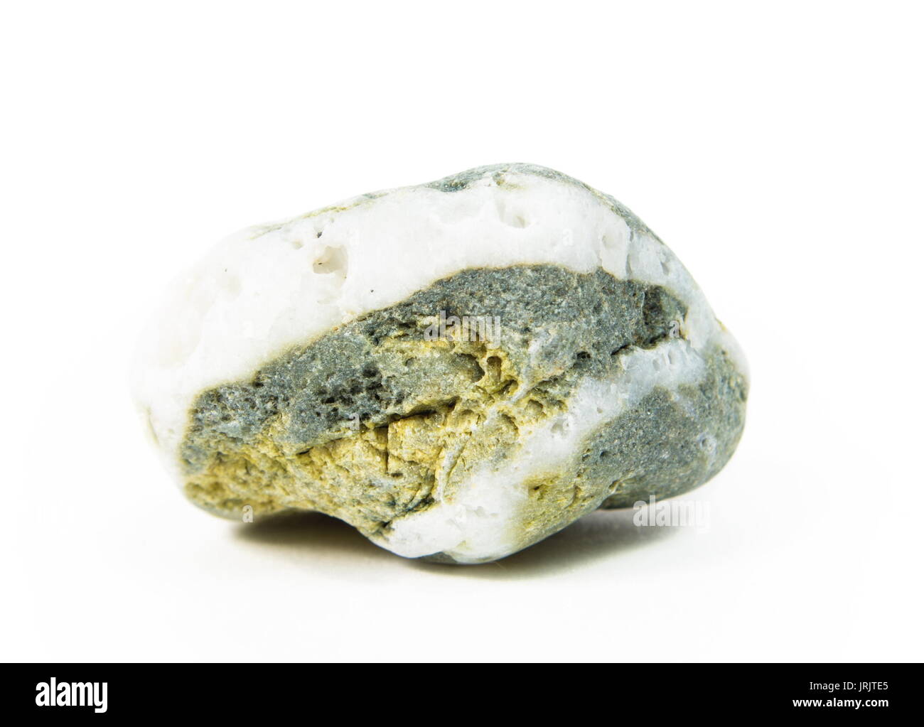 Stone from the sea on white Stock Photo - Alamy
