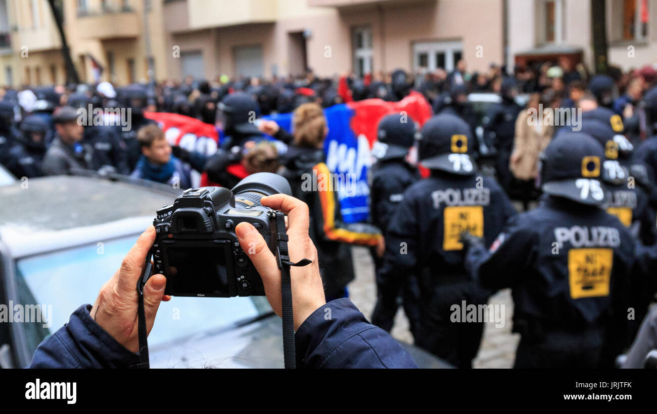 BERLIN, GERMANY - MAY 1, 2017: Riot police and protesters facing off on ...