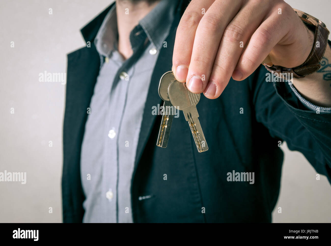 Man giving the new keys Stock Photo - Alamy