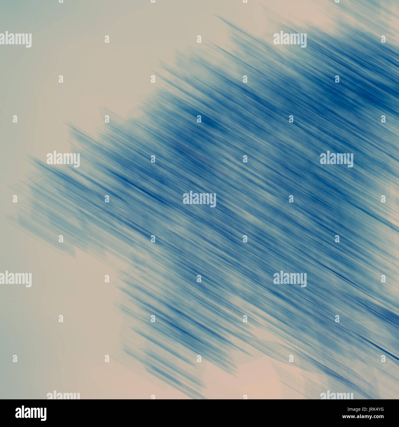 Abstract diagonal spots and lines in blue tonality, blurred background ...