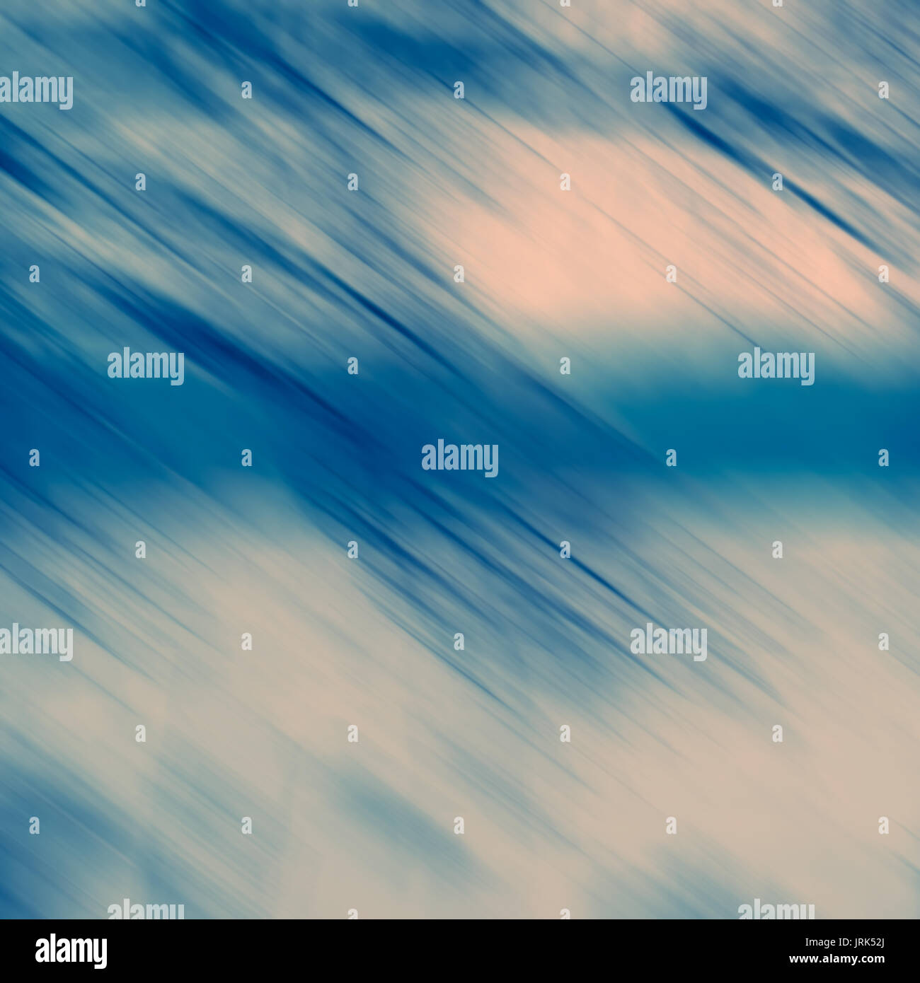 Abstract diagonal spots and lines in blue tonality, blurred background ...