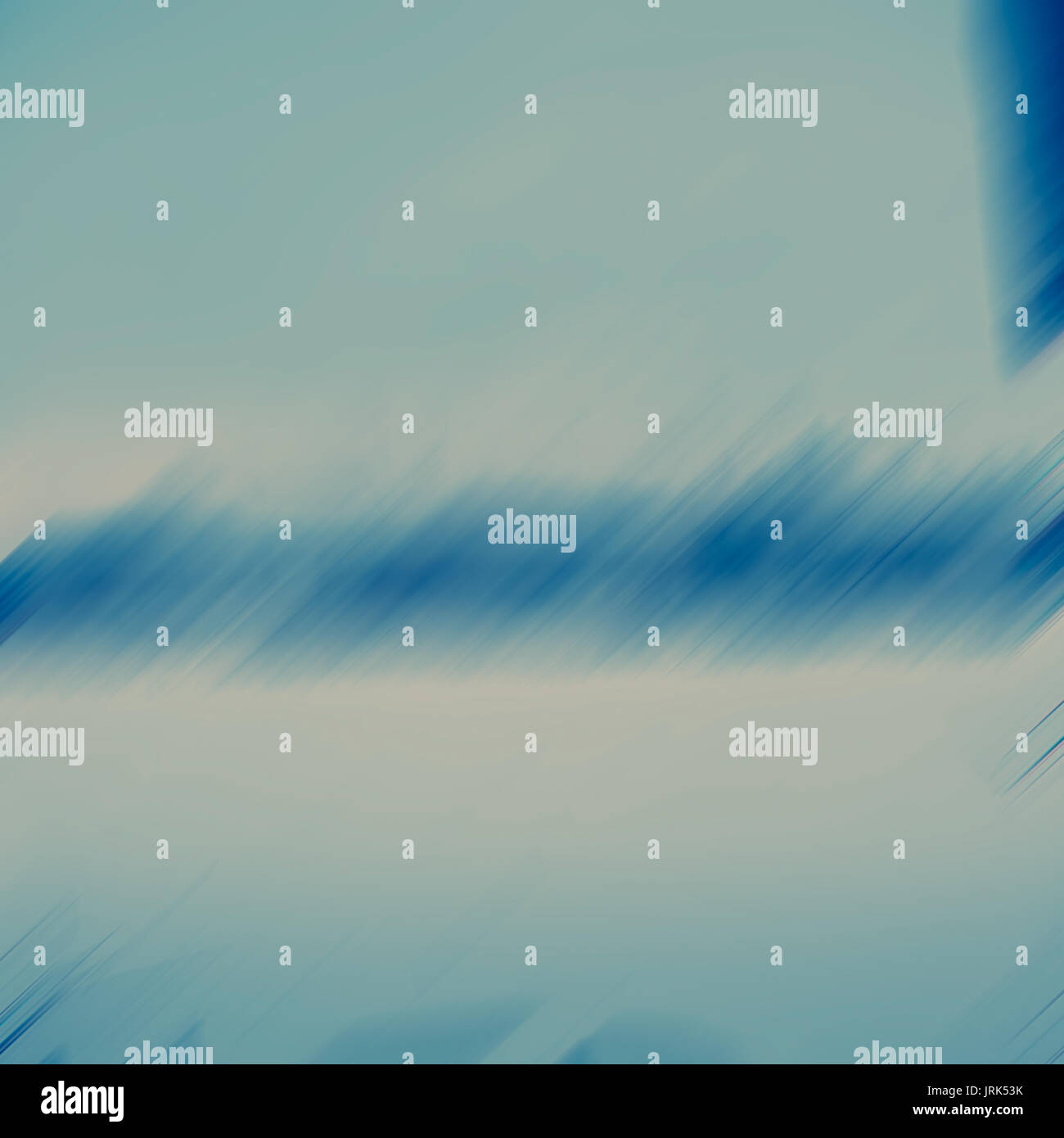 Abstract diagonal spots and lines in blue tonality, blurred background ...