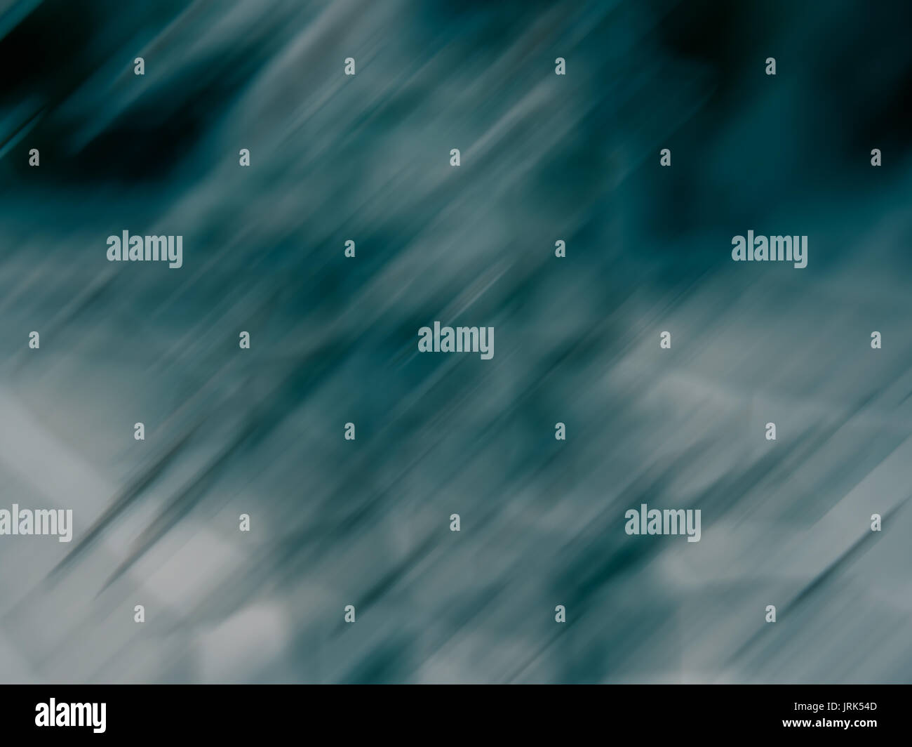 Abstract diagonal spots and lines in blue tonality, blurred background ...