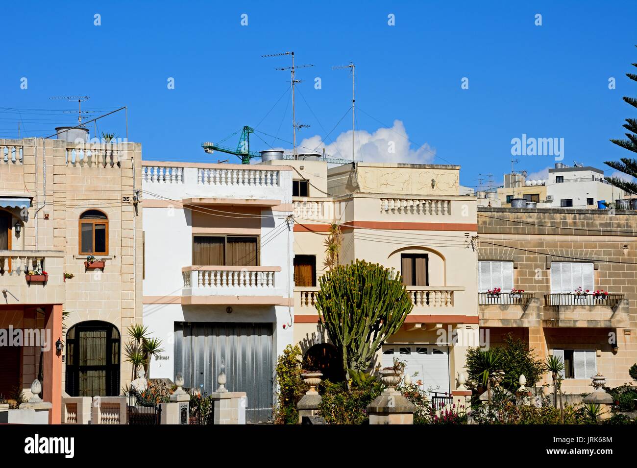Row of traditional Maltese townhouses, Bugibba, Malta, Europe Stock ...
