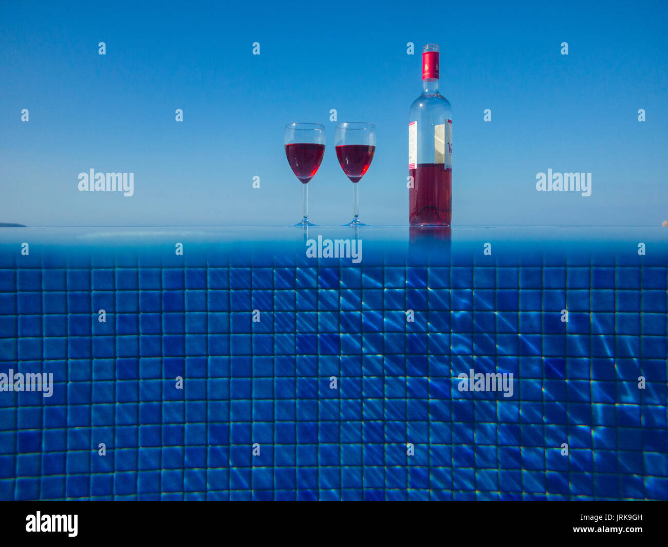 Half underwater swimming pool hi-res stock photography and images - Alamy