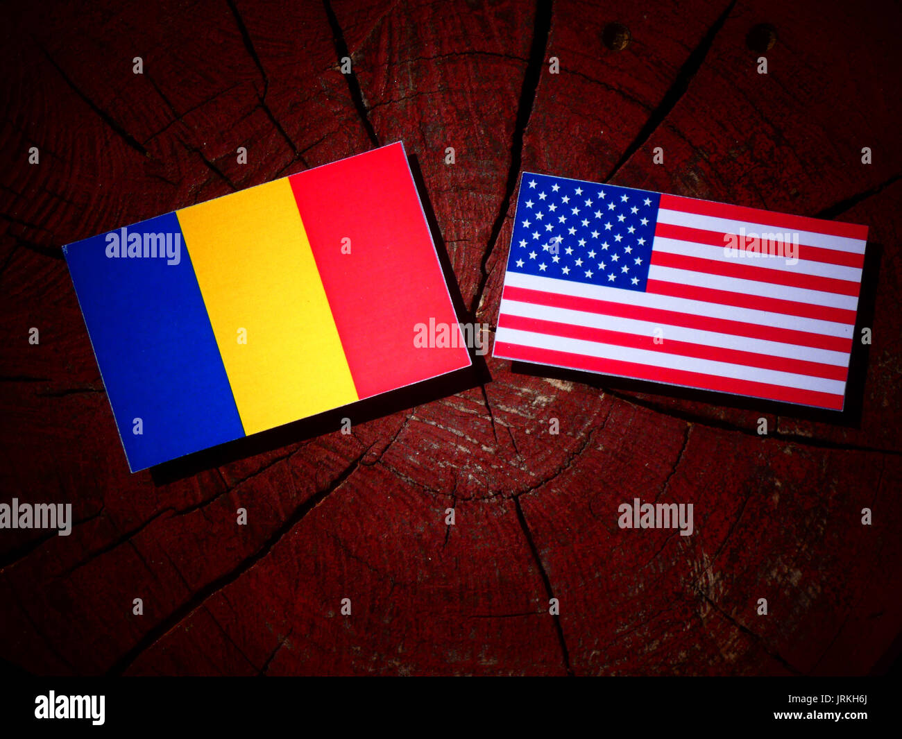Chad flag with USA flag on a tree stump isolated Stock Photo - Alamy