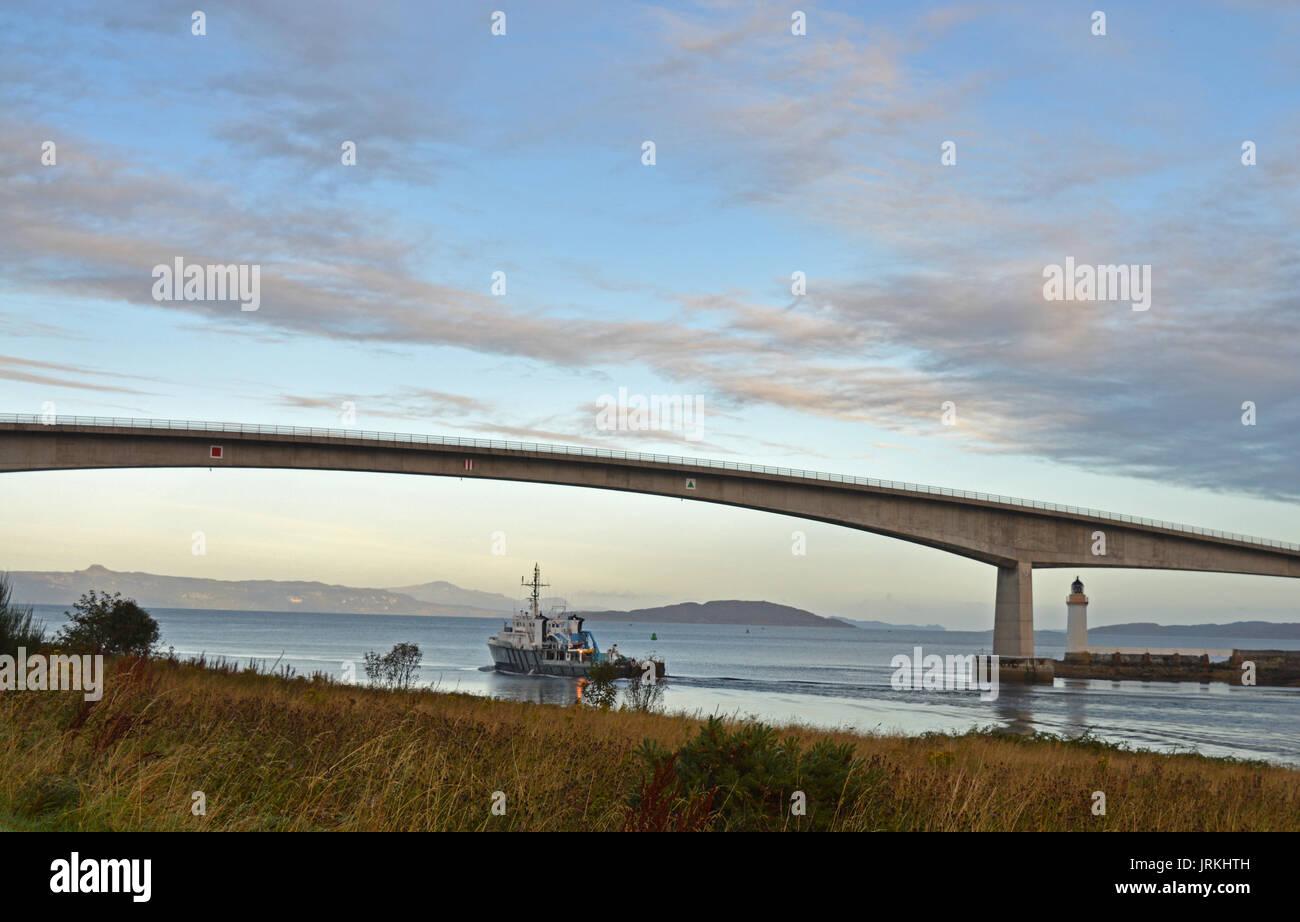 Fishing trawler passing under Isle of Skye road bridge Stock Photo - Alamy
