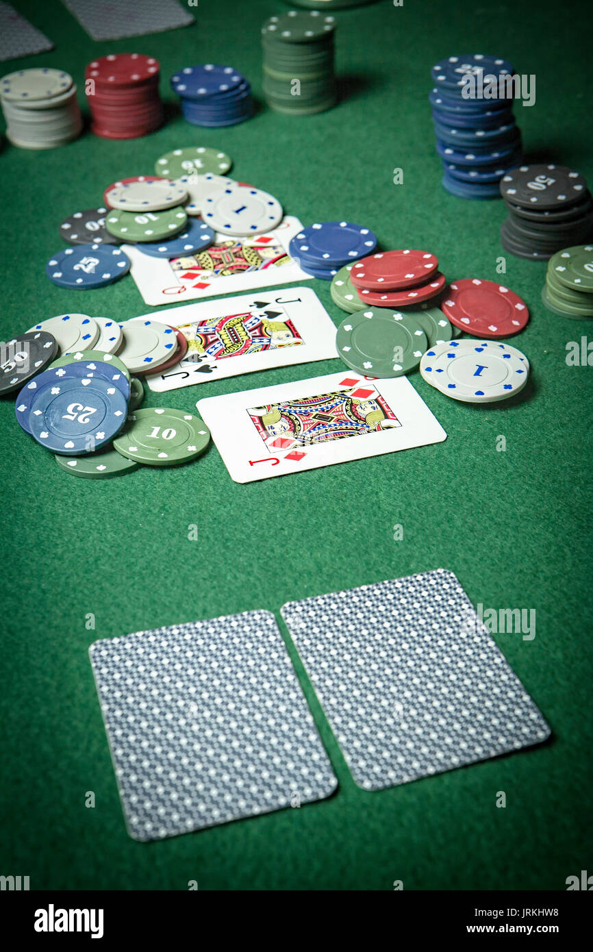 Playing cards on table hi-res stock photography and images - Alamy