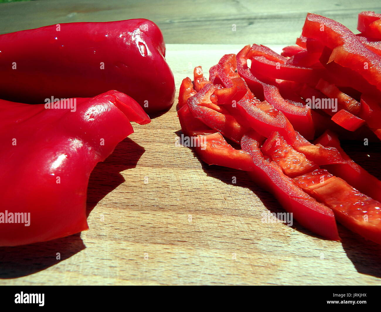 Red sweet pepper, Sliced red pepper Stock Photo - Alamy