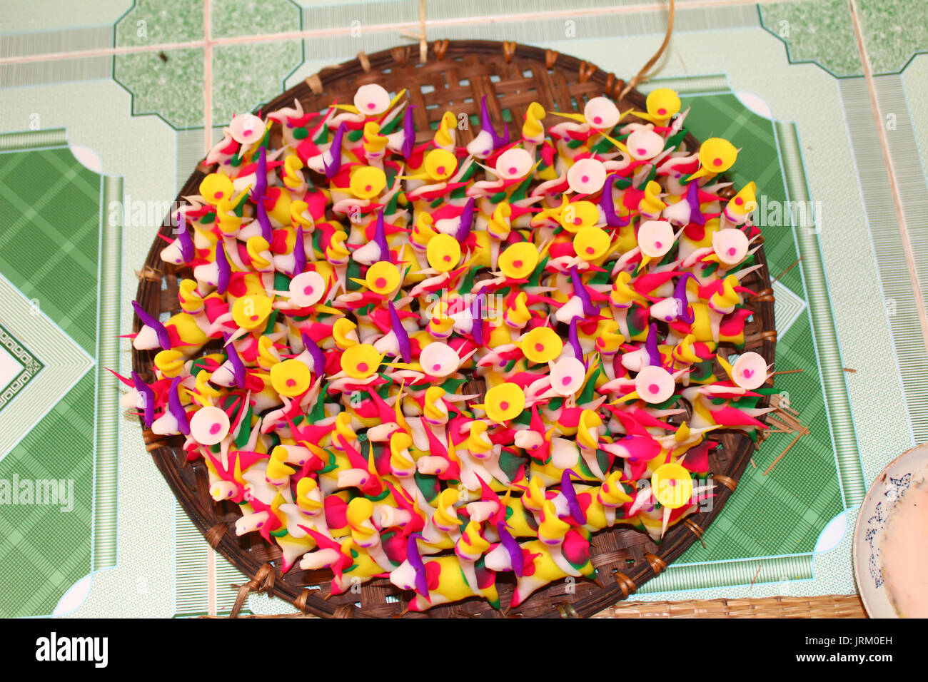 Tohe, the traditional toys in Vietnam made by colored rice powder Stock ...