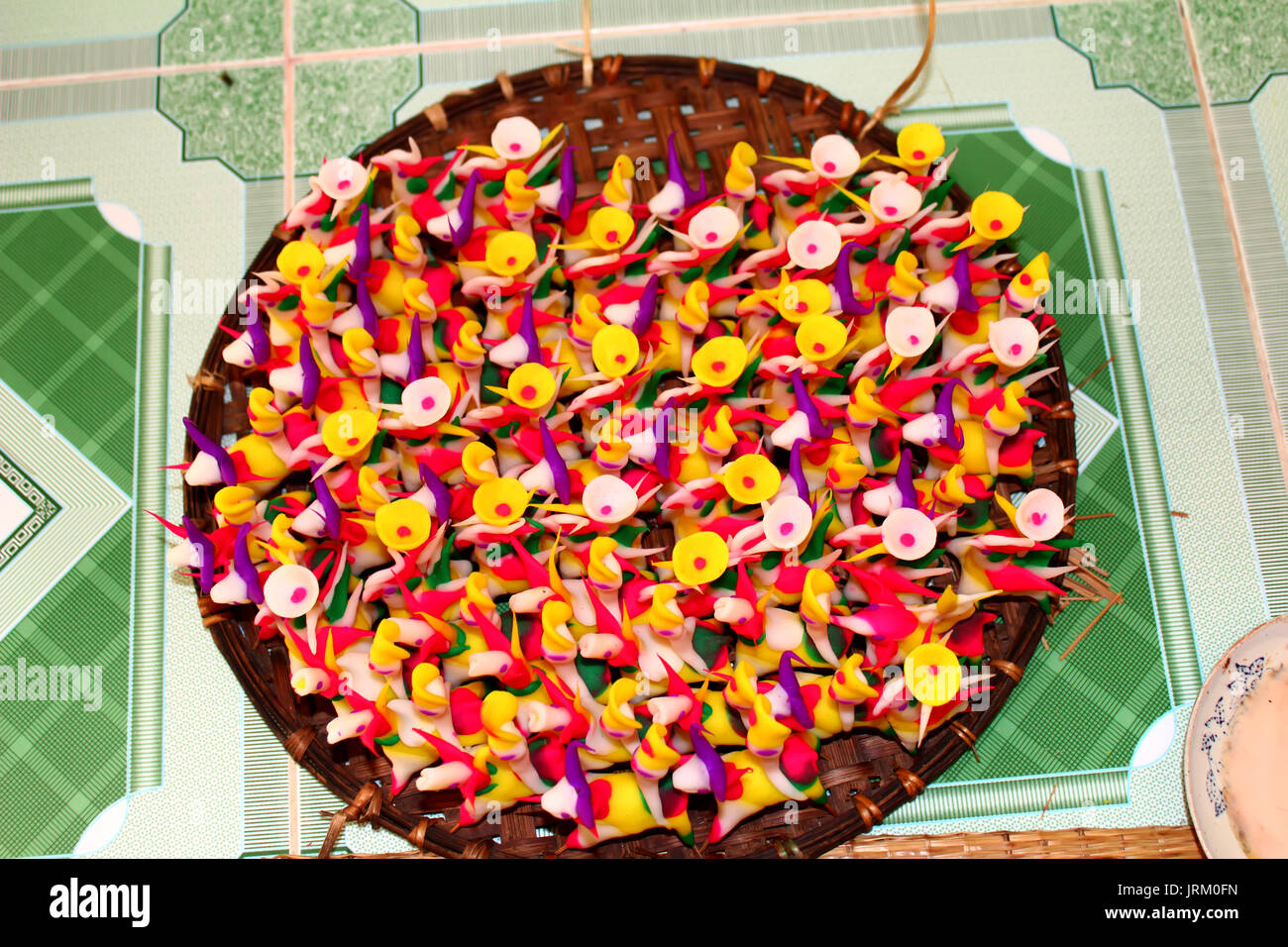 Tohe, the traditional toys in Vietnam made by colored rice powder Stock ...