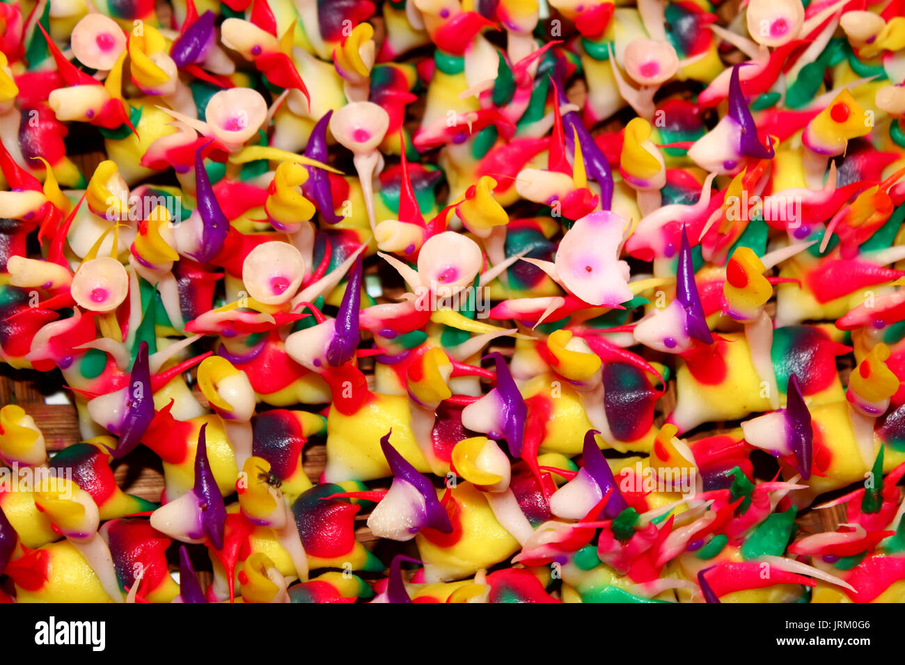 Tohe, the traditional toys in Vietnam made by colored rice powder Stock ...