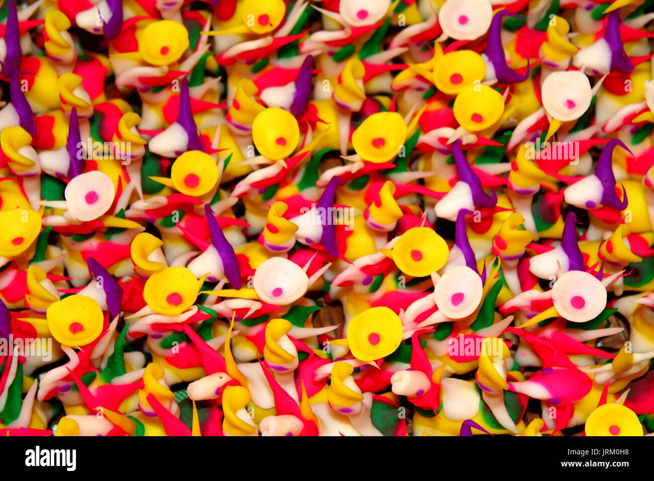 Tohe, the traditional toys in Vietnam made by colored rice powder Stock ...