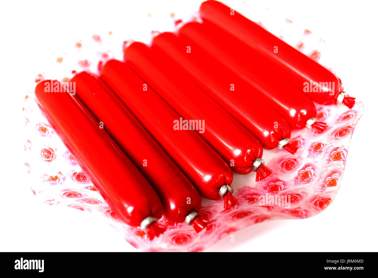 red sausage in pink plate Stock Photo - Alamy