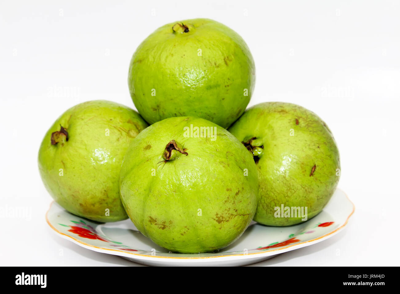 Whole fresh guava fruit on white background Stock Photo - Alamy