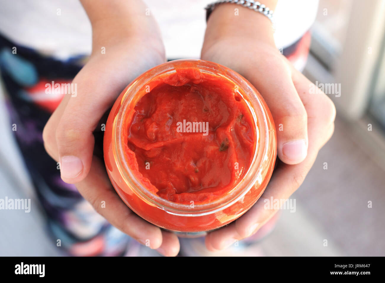 Tomato sauce bottle hand hi-res stock photography and images - Alamy