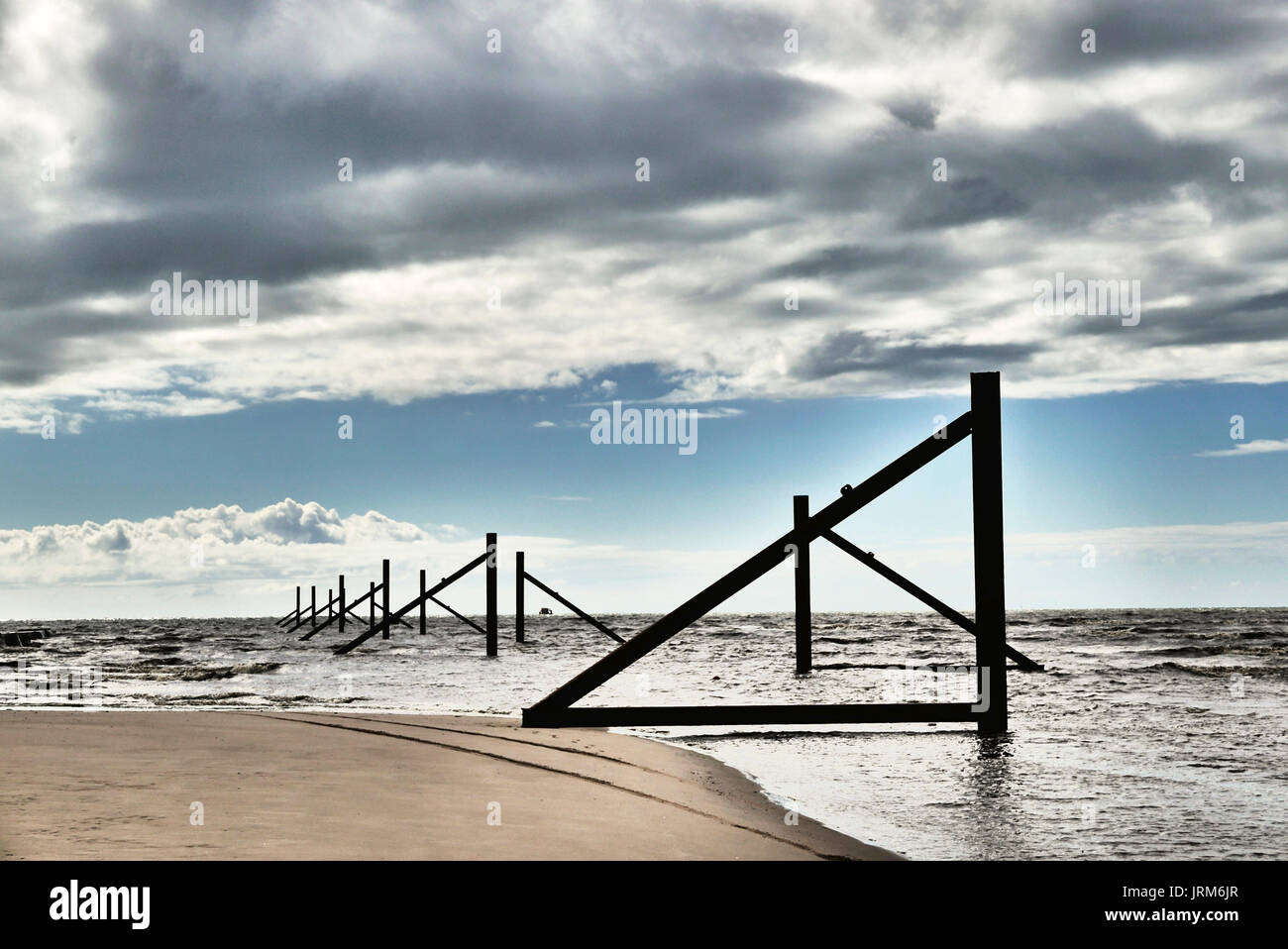 Guide poles for positioning of a new overflow pipeline being put into ...