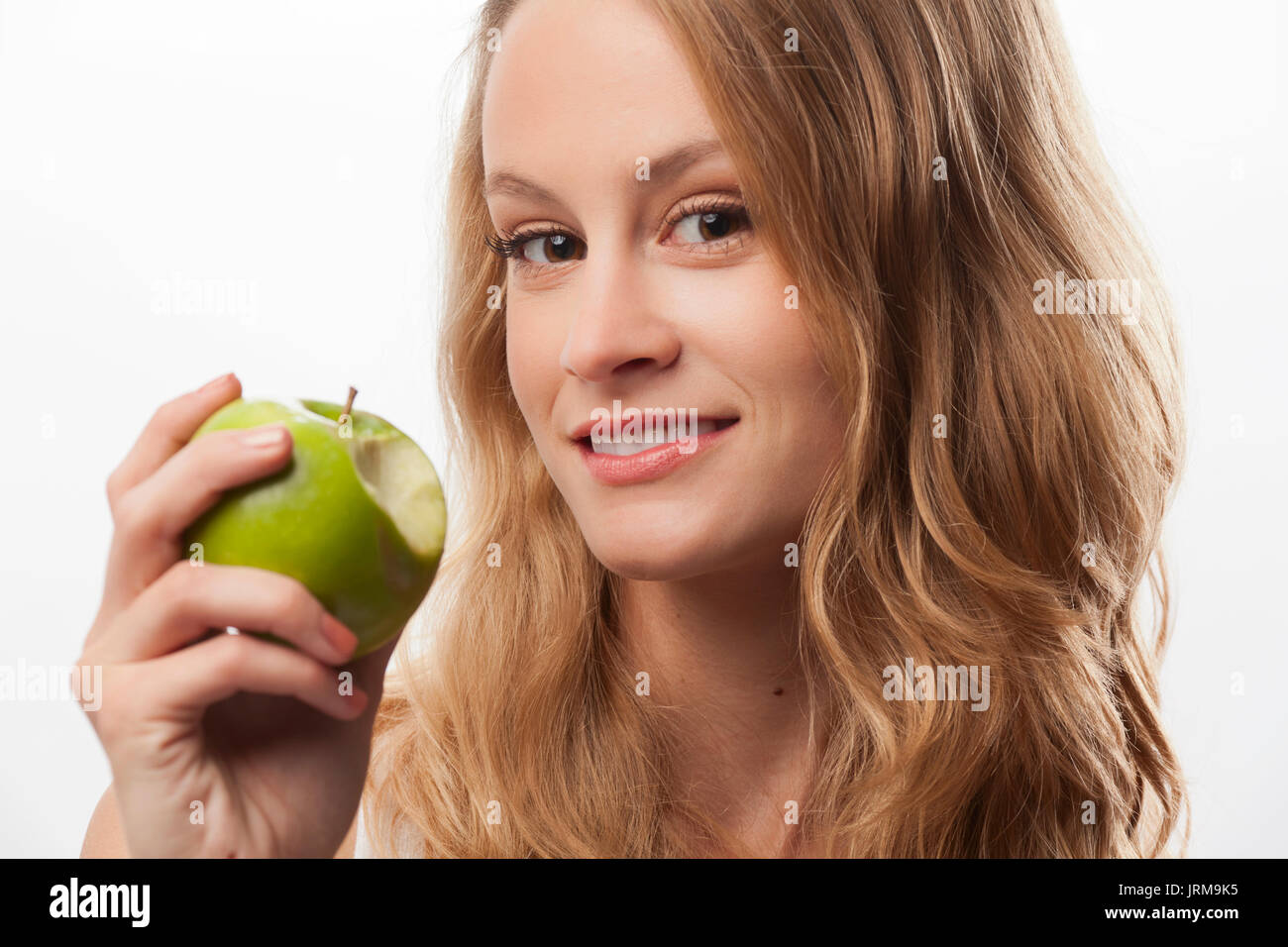 Body positive woman eating apple hi-res stock photography and images ...