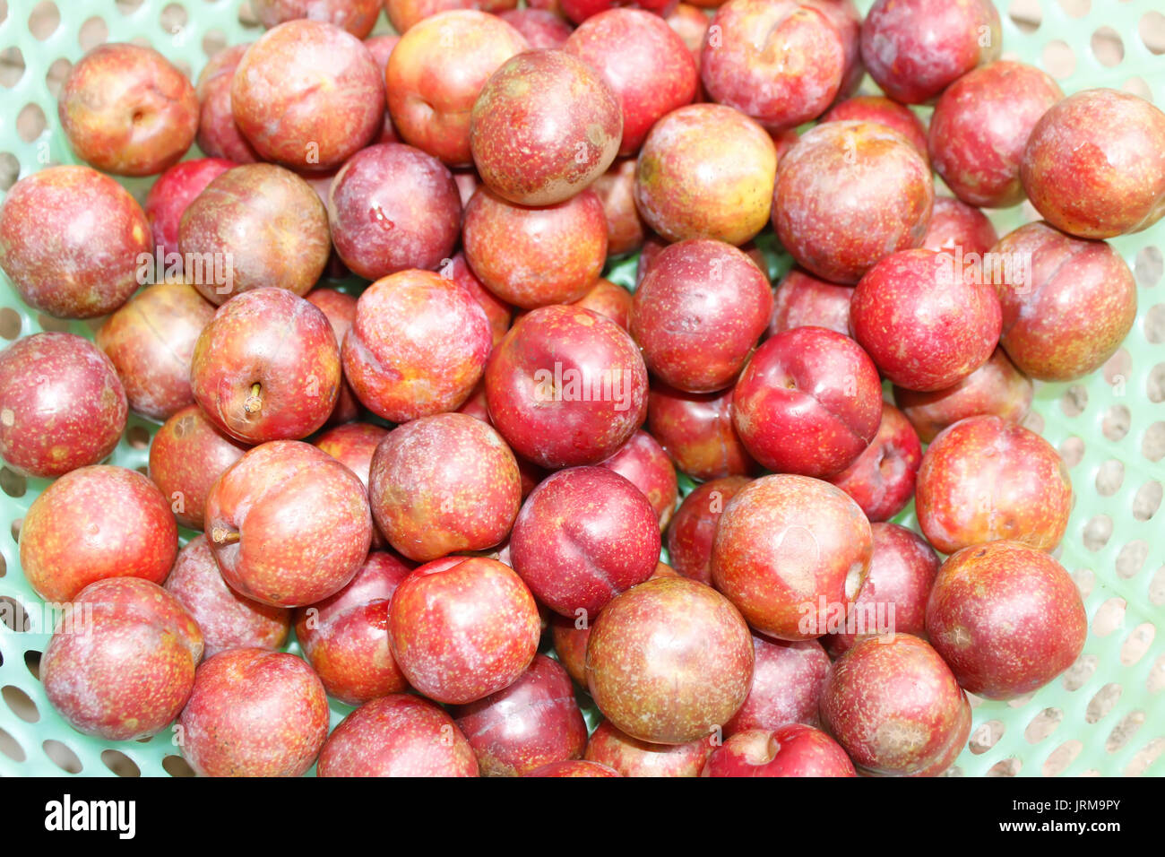 Wet plums on plate hi-res stock photography and images - Alamy