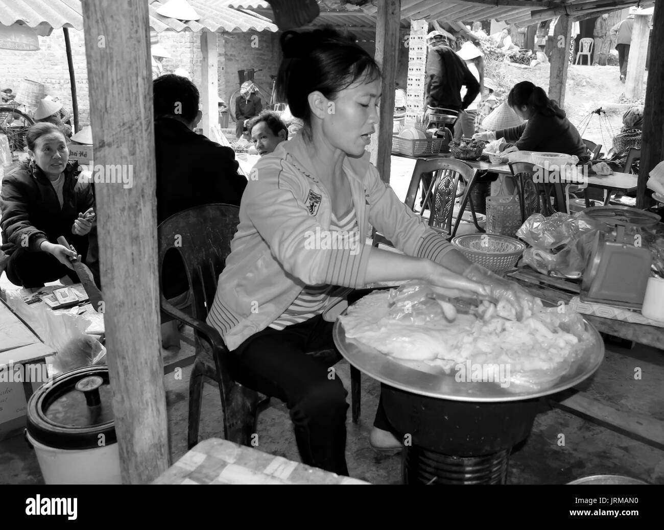 HAI DUONG, VIETNAM, APRIL, 10: Asian woman selling rice cake in the ...