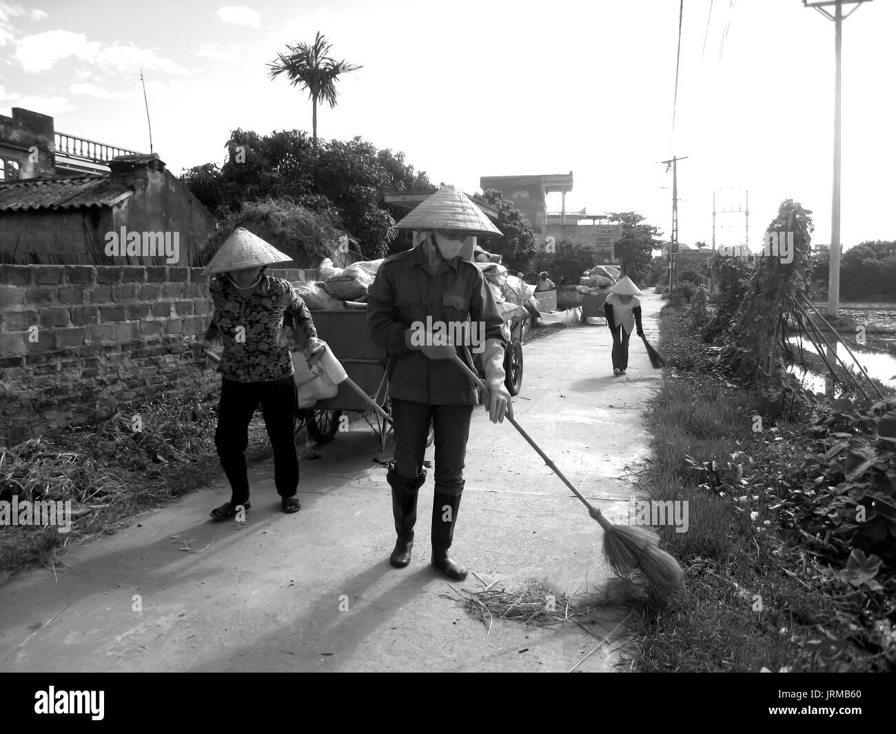 HAI DUONG, VIETNAM, September, 24: workers sweep and collect garbage on ...