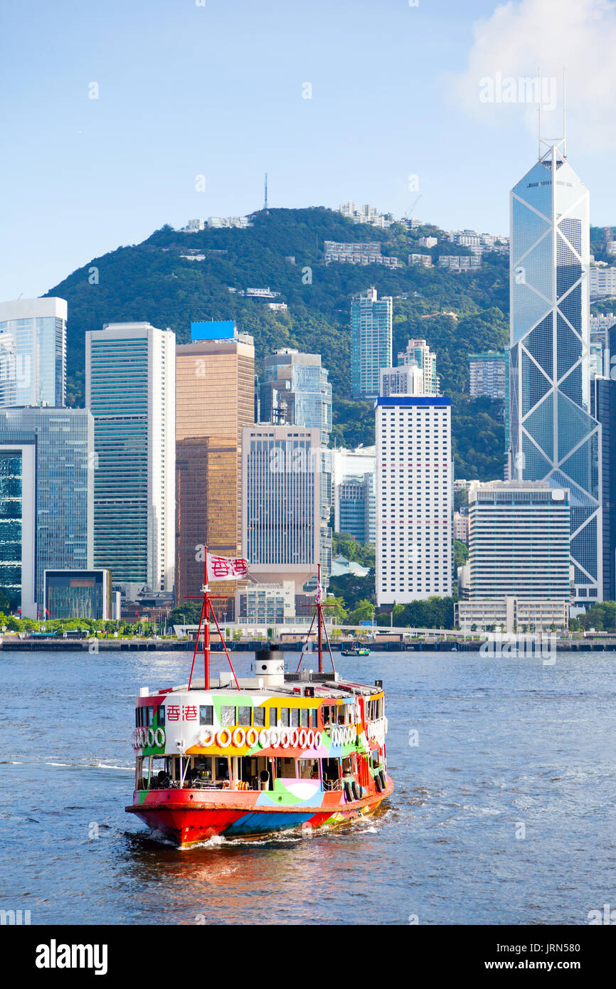 A Star Ferry approaches a ferry terminal at Tsim Sha Tsui in Hong Kong ...