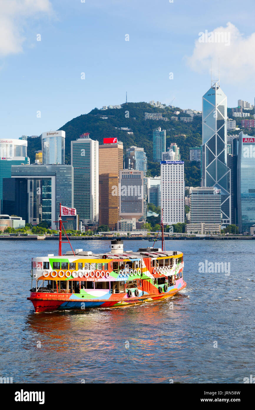 A Star Ferry approaches a ferry terminal at Tsim Sha Tsui in Hong Kong. The city's iconic Star ...