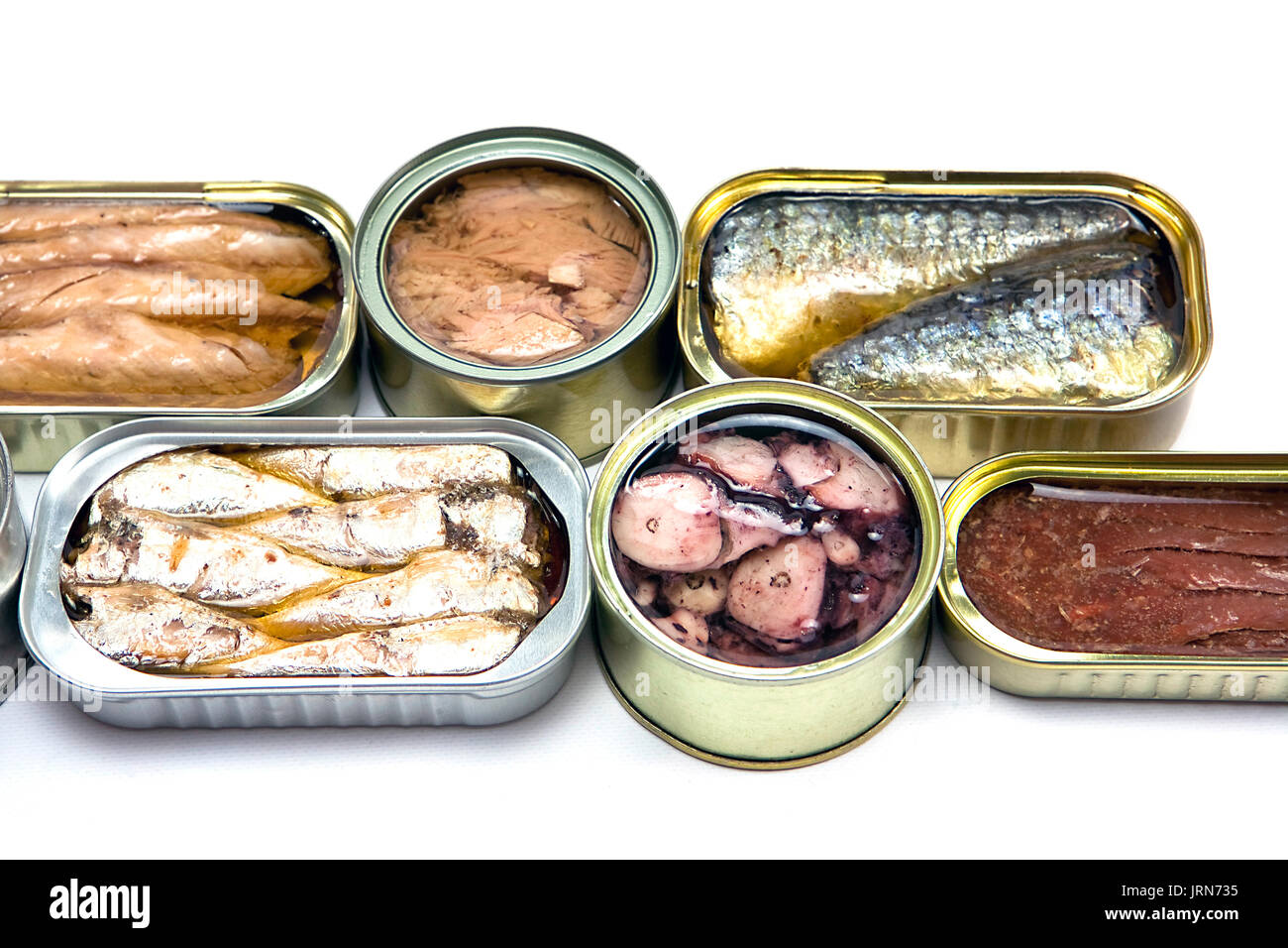 Tins of different sizes and opening Stock Photo - Alamy