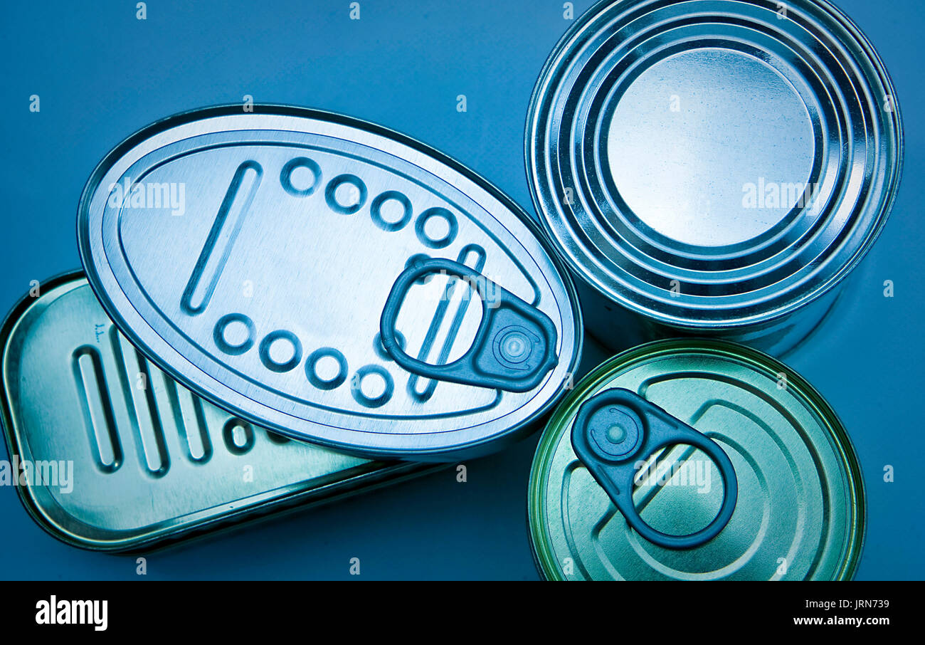 Tins of different sizes and opening Stock Photo - Alamy