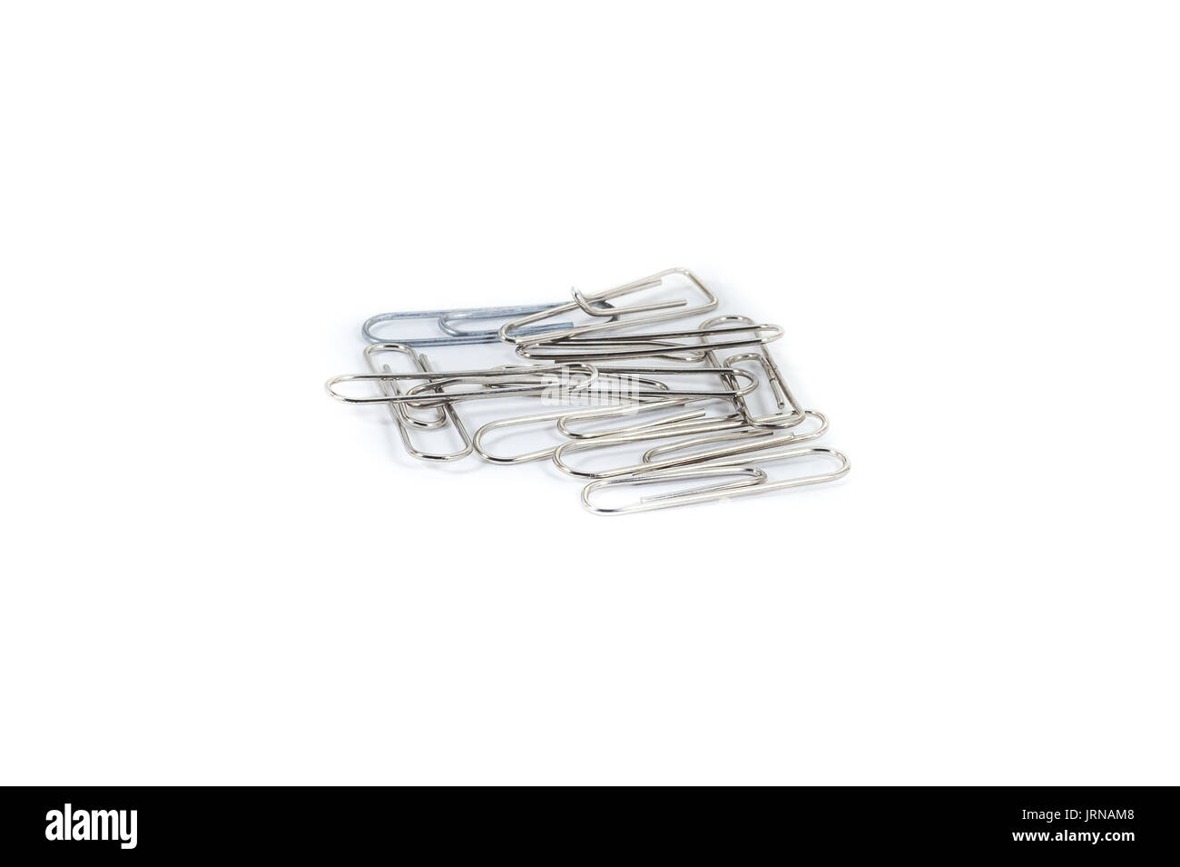 a pile of paper clips on white isolate background Stock Photo - Alamy
