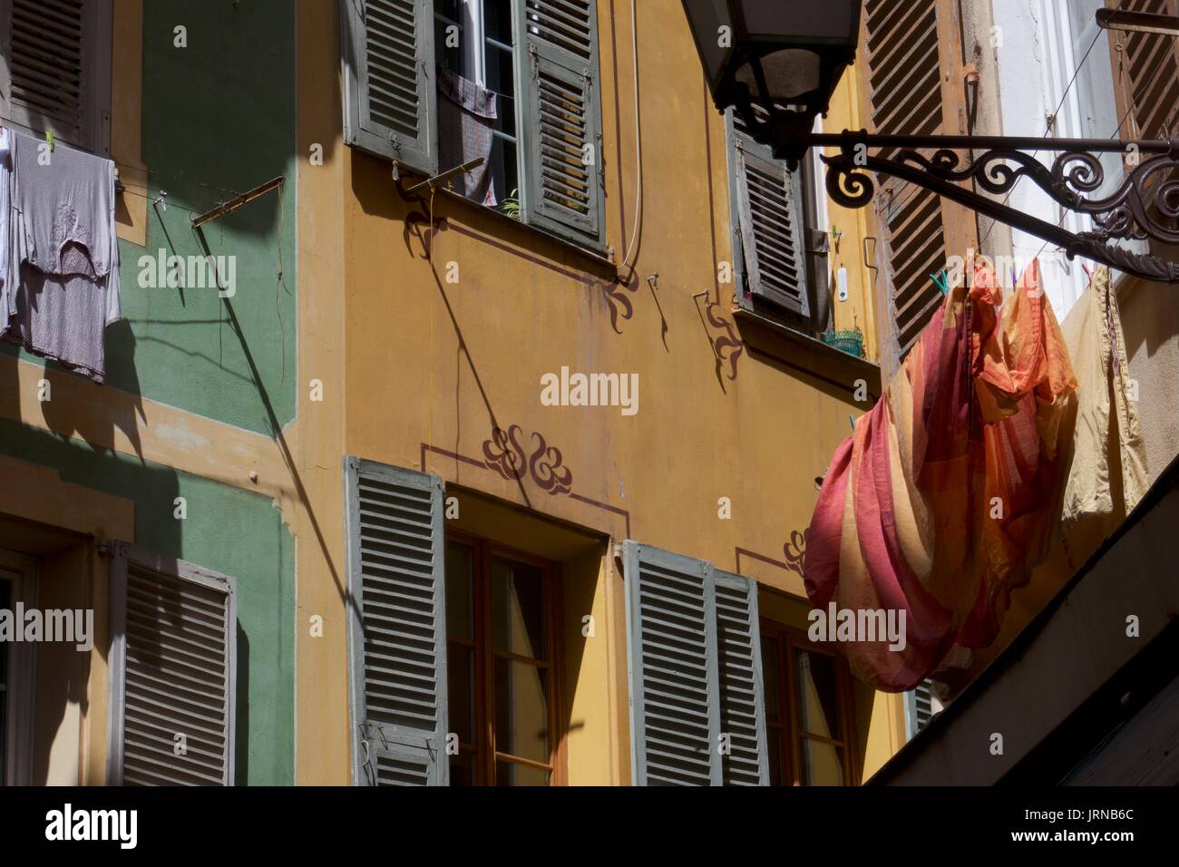 Laundry on washing line outside traditional old town apartment, Nice ...