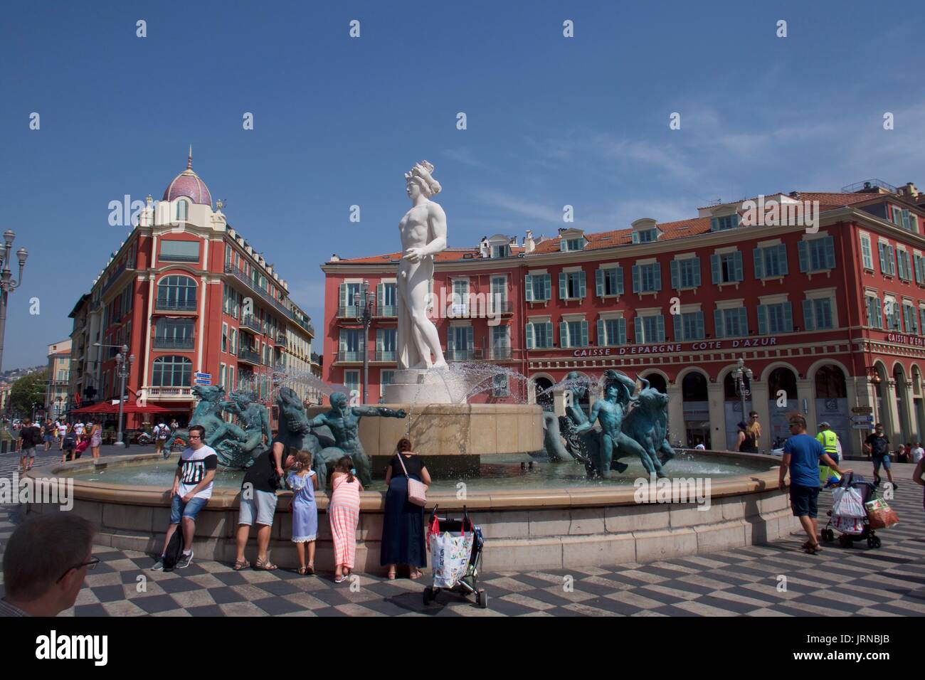 Tourists at water fountain in Massena Square, Nice, France Stock Photo ...