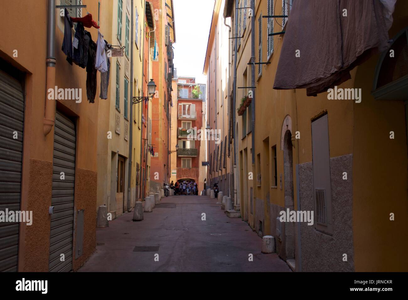Narrow alley between old town apartment exteriors, Nice, France Stock ...