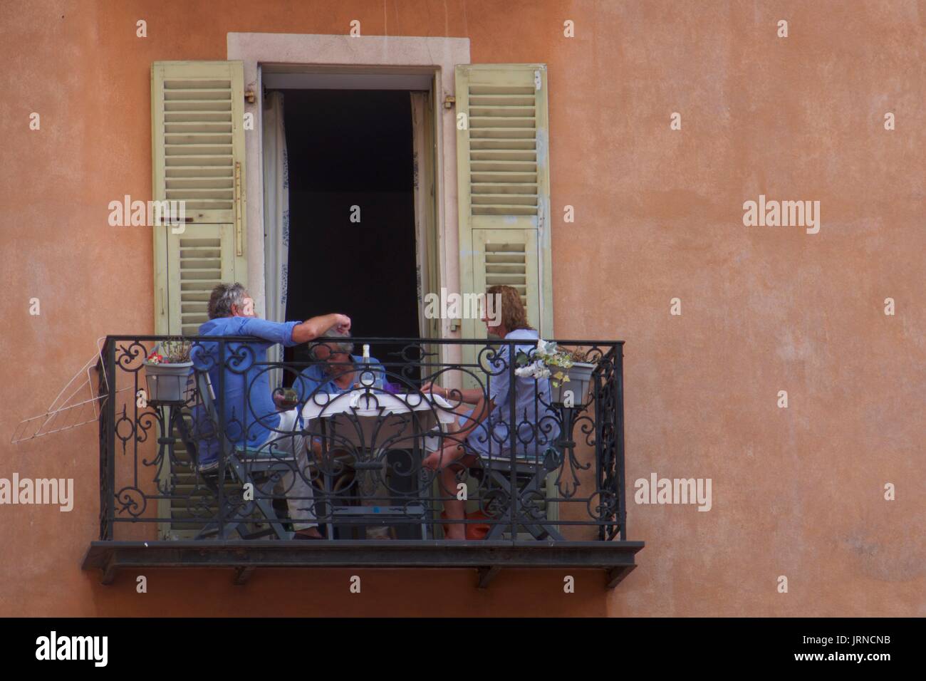 Sitting on the balcony hi-res stock photography and images - Alamy