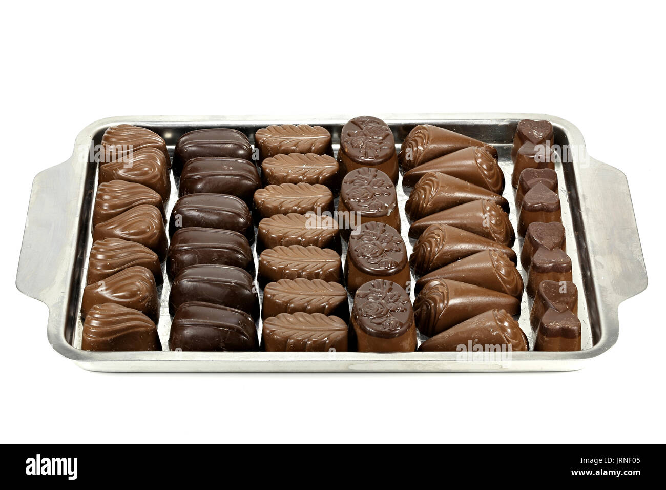 tray with Belgian chocolate pralines isolated on white background Stock ...