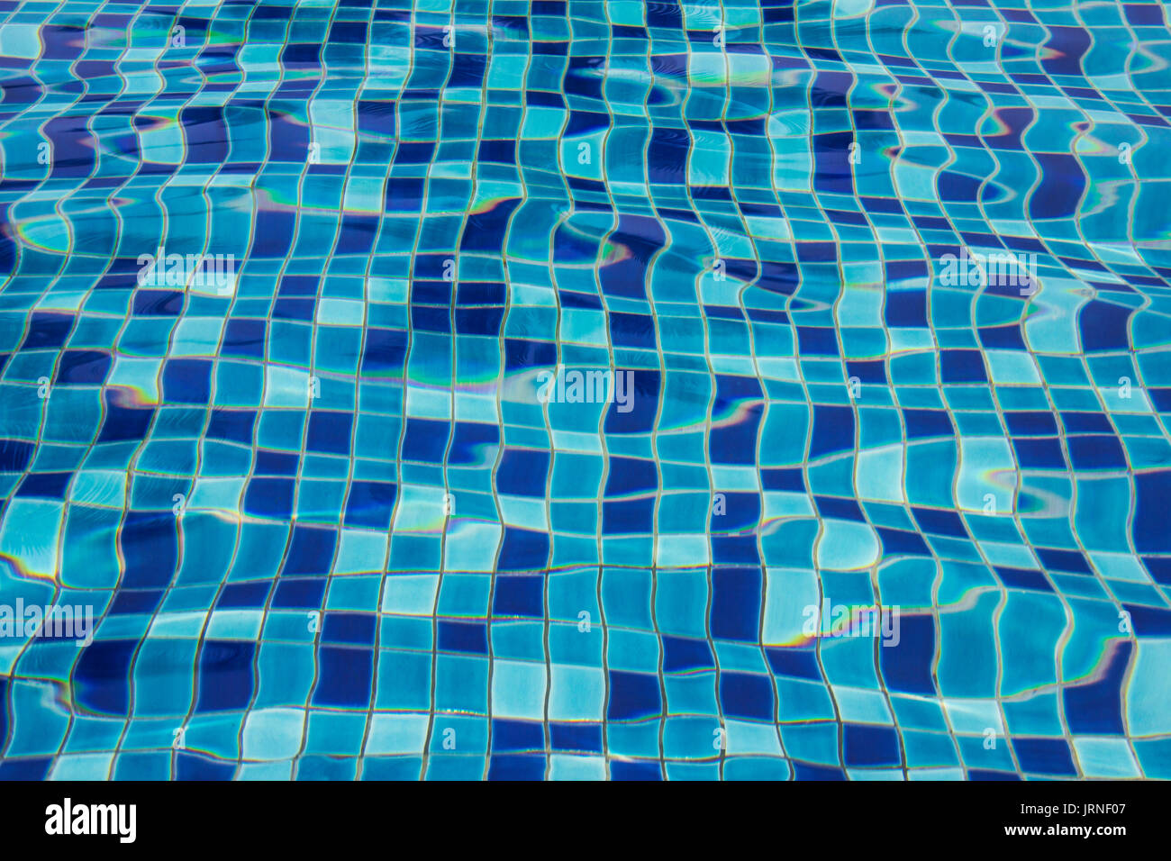 pool water surface ripples with checkered blue floor background Stock ...