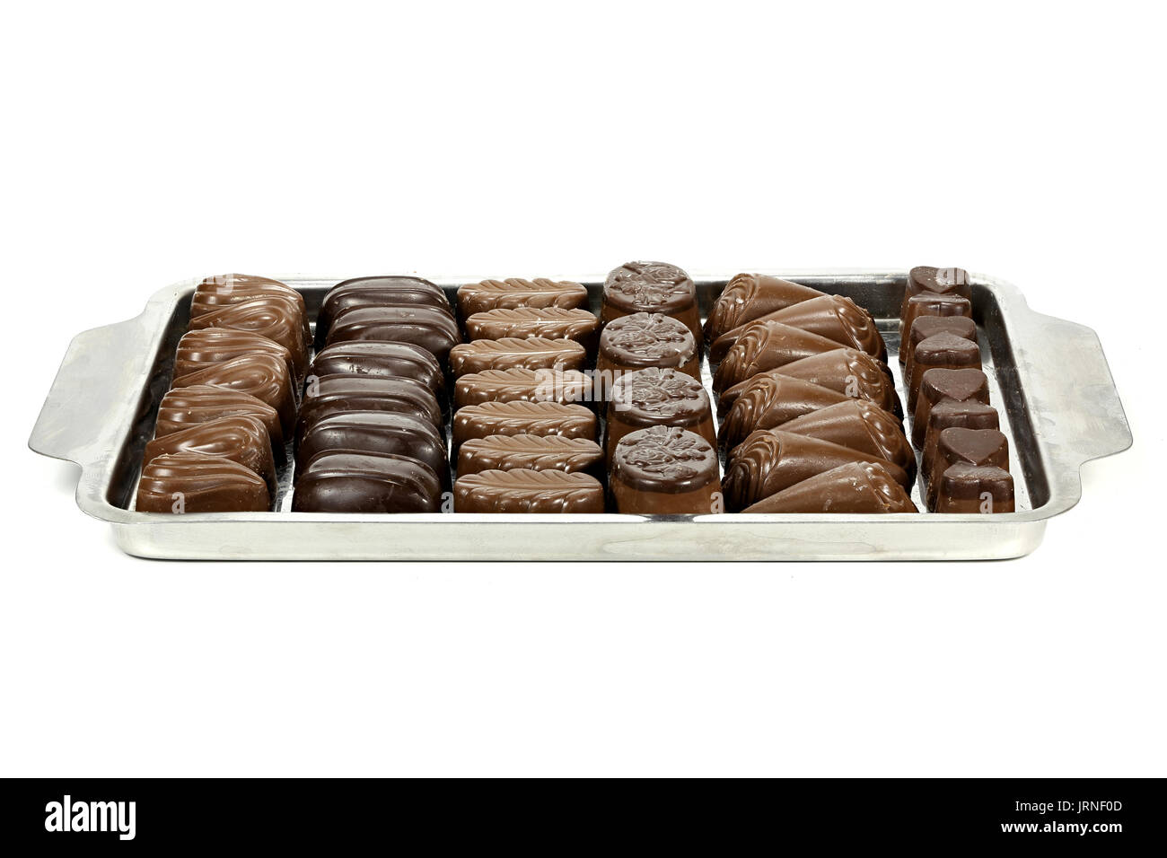 tray with Belgian chocolate pralines isolated on white background Stock ...