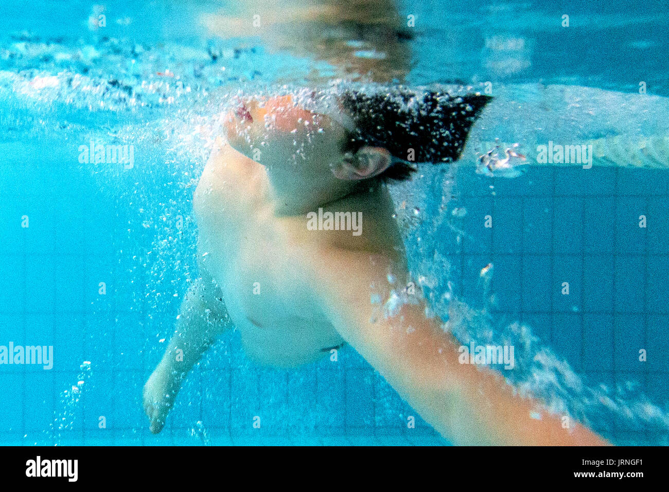 Boy diving hi-res stock photography and images - Alamy