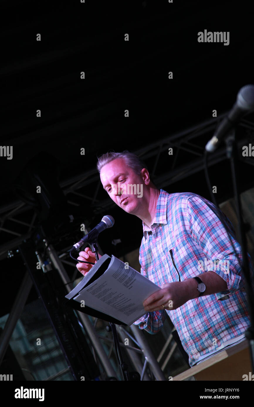 Manchester, UK, 5 August 2017. Tony Walsh, aka Longfella, reciting his ...