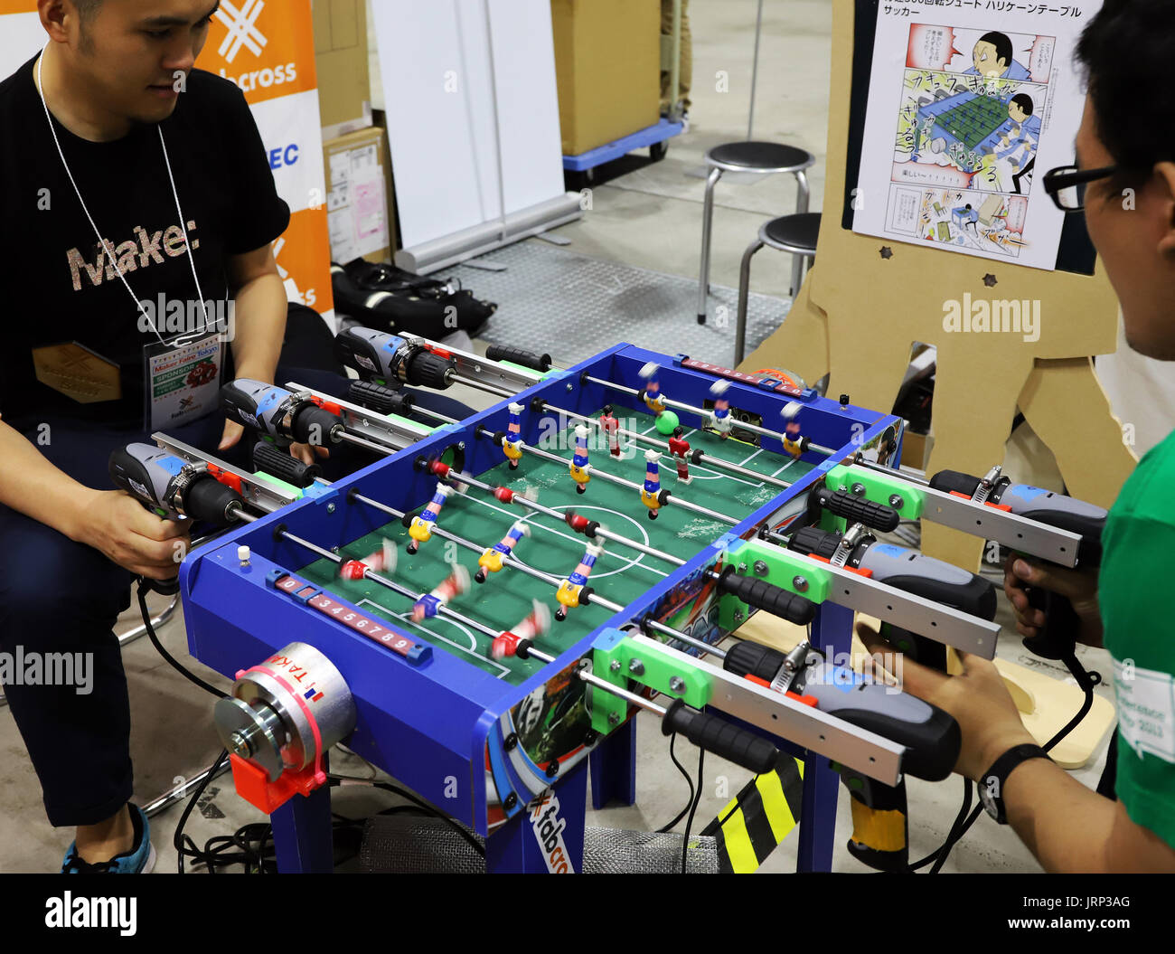 Tokyo, Japan. 5th Aug, 2017. Exhibitors demonstrate a table soccer game ...