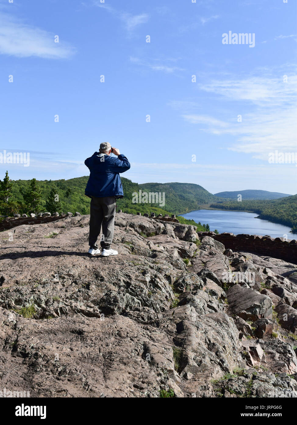 Viewing a scenic mountain overlook Stock Photo - Alamy