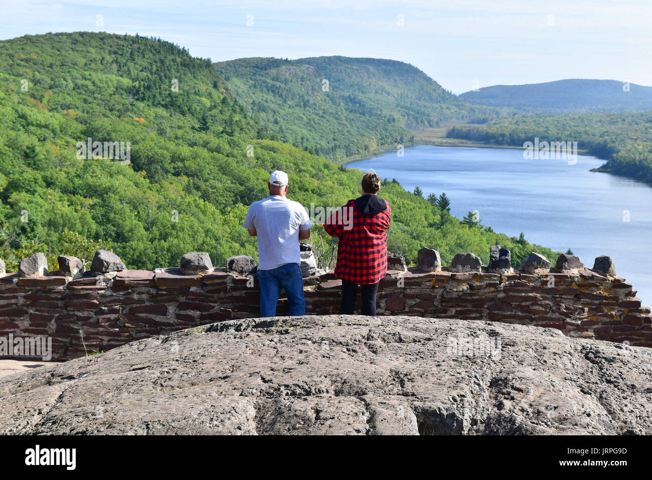 Viewing a scenic mountain overlook Stock Photo - Alamy