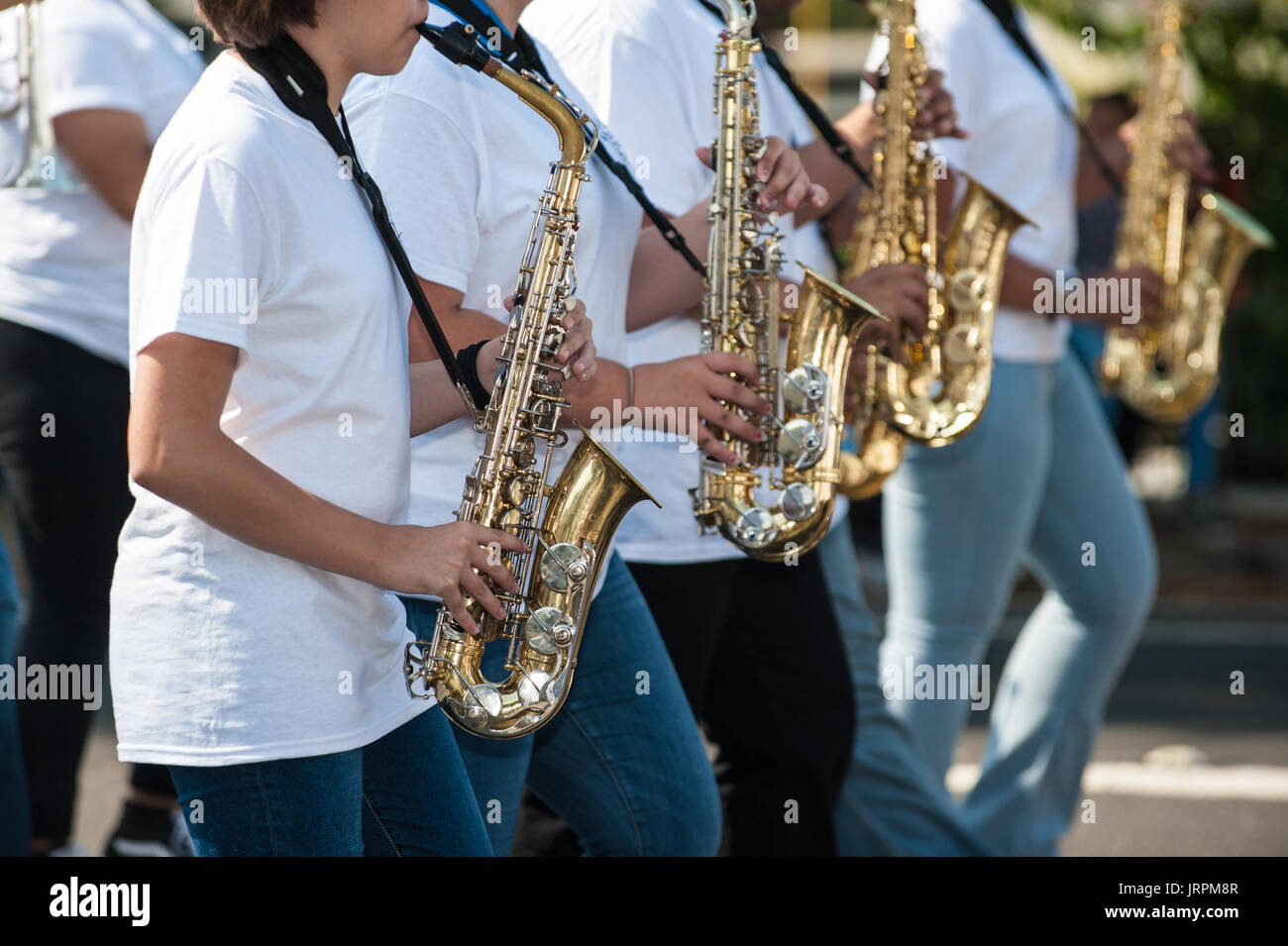 Marching band saxophone players with hands on the keys Stock Photo - Alamy